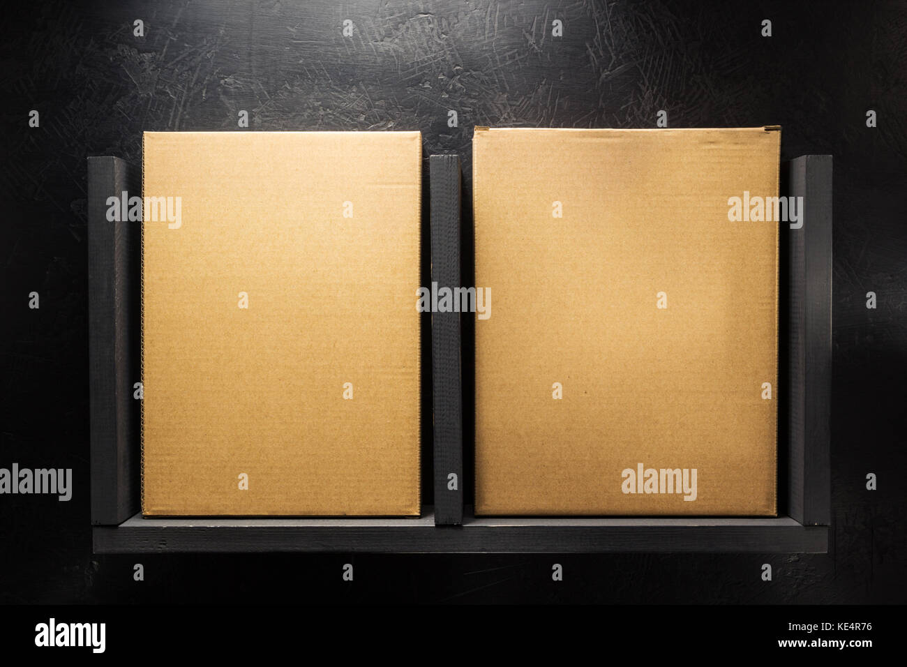 cardboard box at black background surface Stock Photo - Alamy