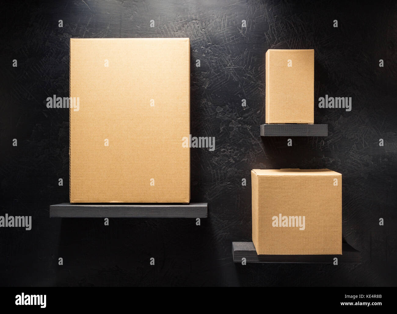 cardboard box at black background surface Stock Photo - Alamy