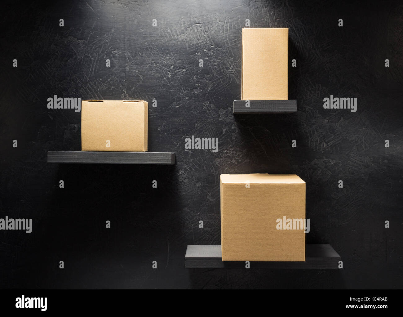 cardboard box at black background surface Stock Photo - Alamy