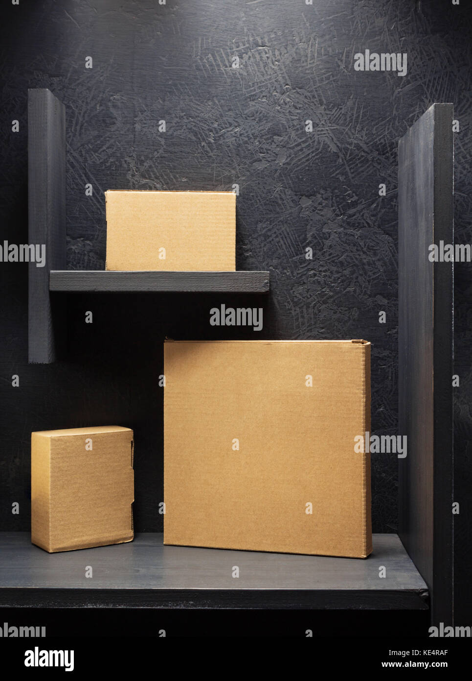 cardboard box at black background surface Stock Photo - Alamy