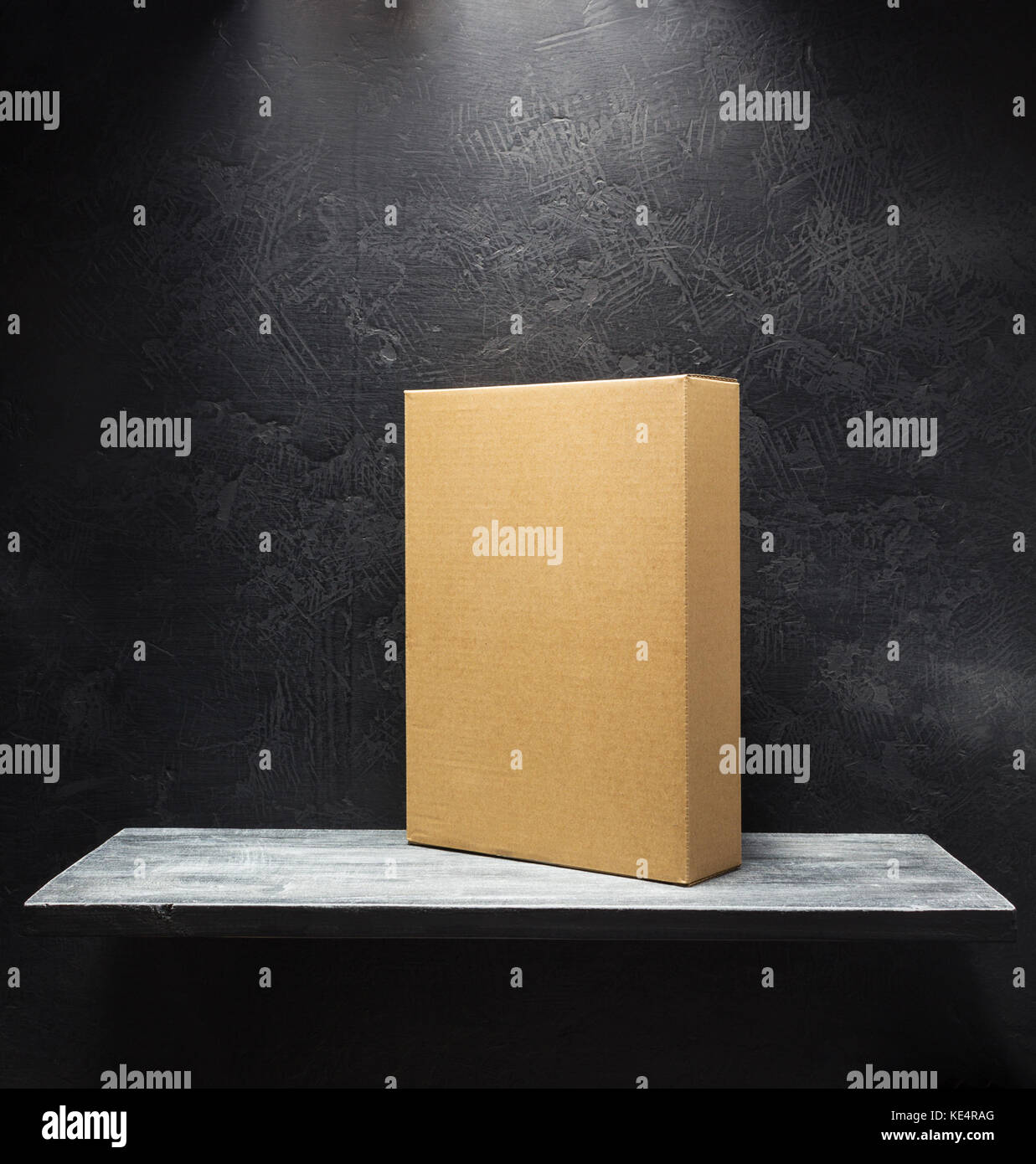 cardboard box at black background surface Stock Photo - Alamy
