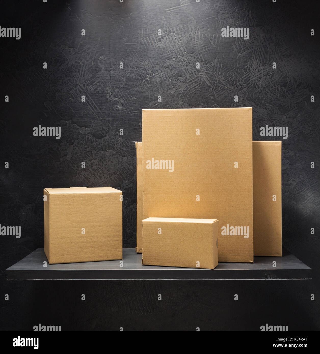 cardboard box at black background surface Stock Photo - Alamy