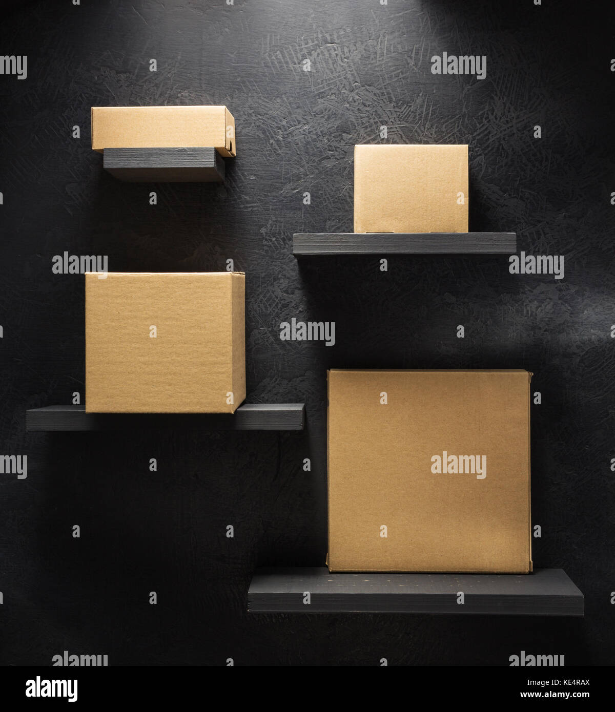 cardboard box at black background surface Stock Photo - Alamy