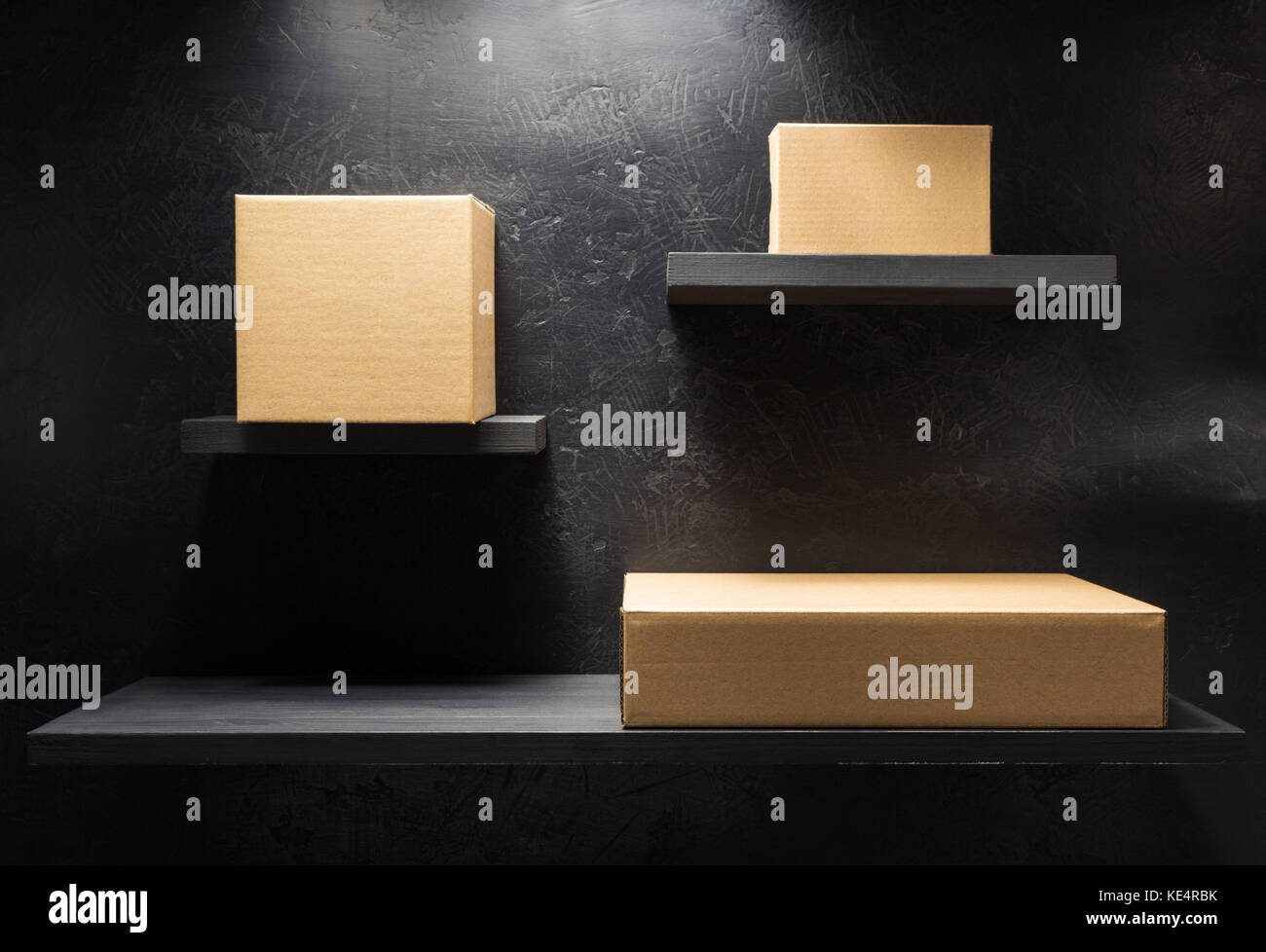 cardboard box at black background surface Stock Photo - Alamy