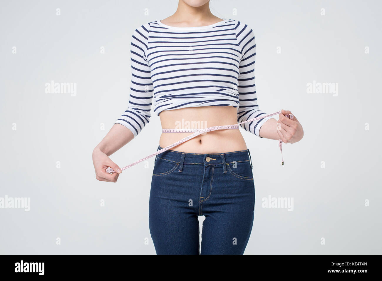 Body line of young slim woman Stock Photo - Alamy