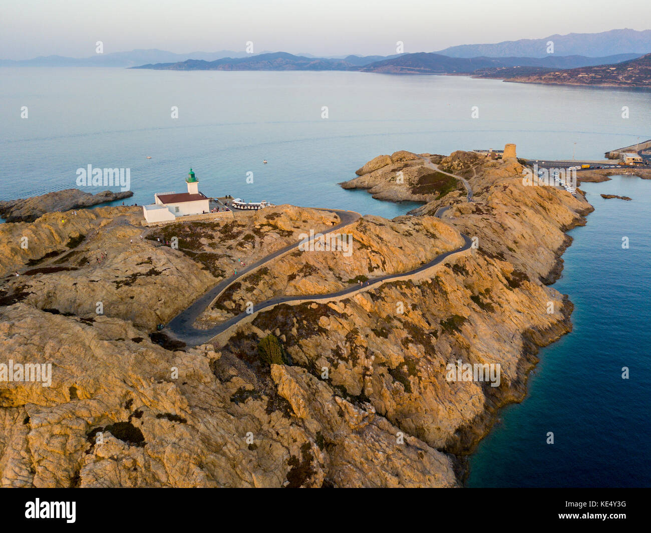 Aerial view of the Pietra Lighthouse at sunset and the Genoese tower, L ...