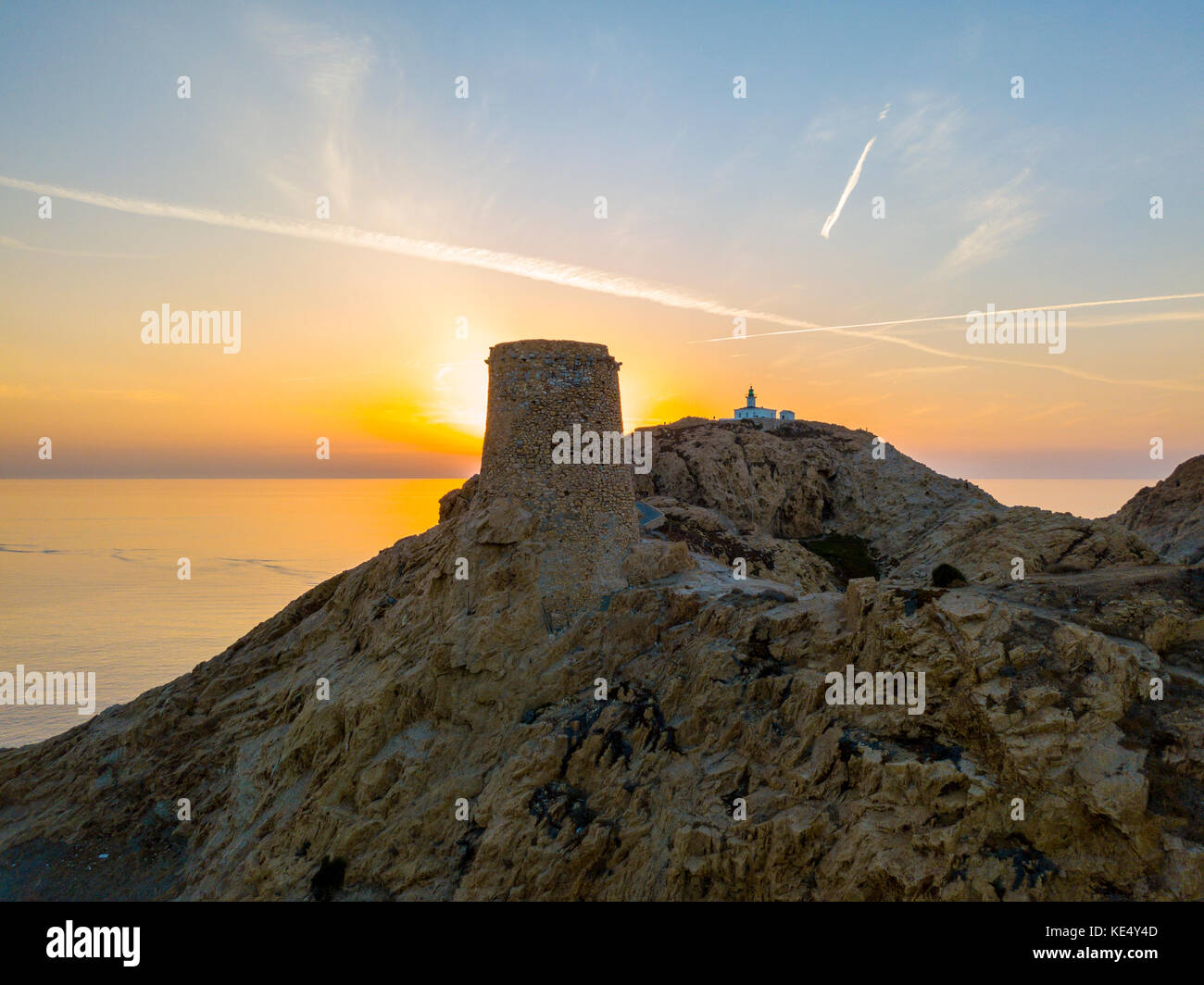 Aerial view of the Pietra Lighthouse at sunset and the Genoese tower, L ...