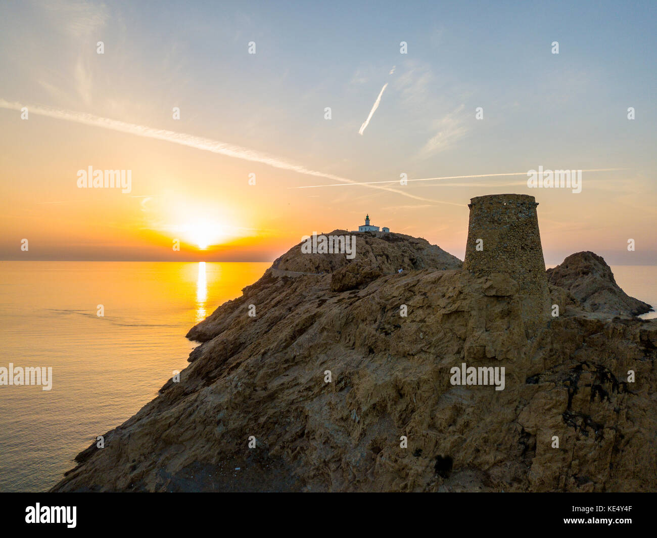 Aerial view of the Pietra Lighthouse at sunset and the Genoese tower, L ...
