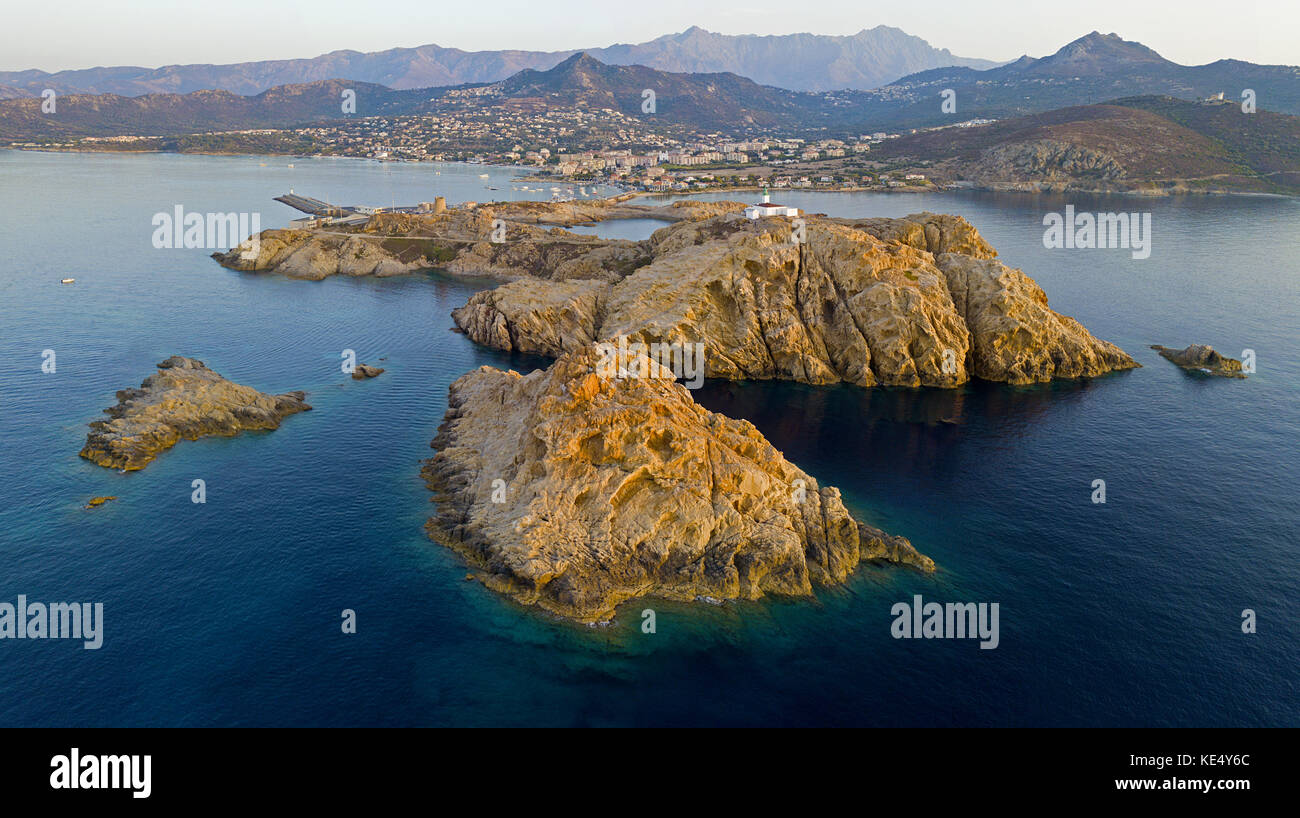 Aerial view of the Pietra Lighthouse at sunset and the Genoese tower, L ...
