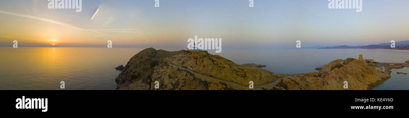 Aerial view of the Pietra Lighthouse at sunset and the Genoese tower, L ...