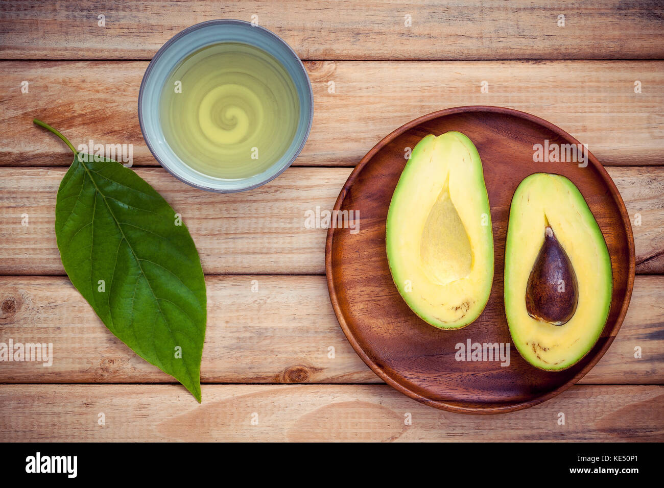 Food background with fresh organic avocado . Fresh cutting avocado on ...
