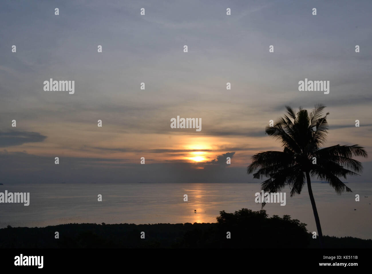 The sunset in Karimun Jawa in the north of Java Island. It has much ...