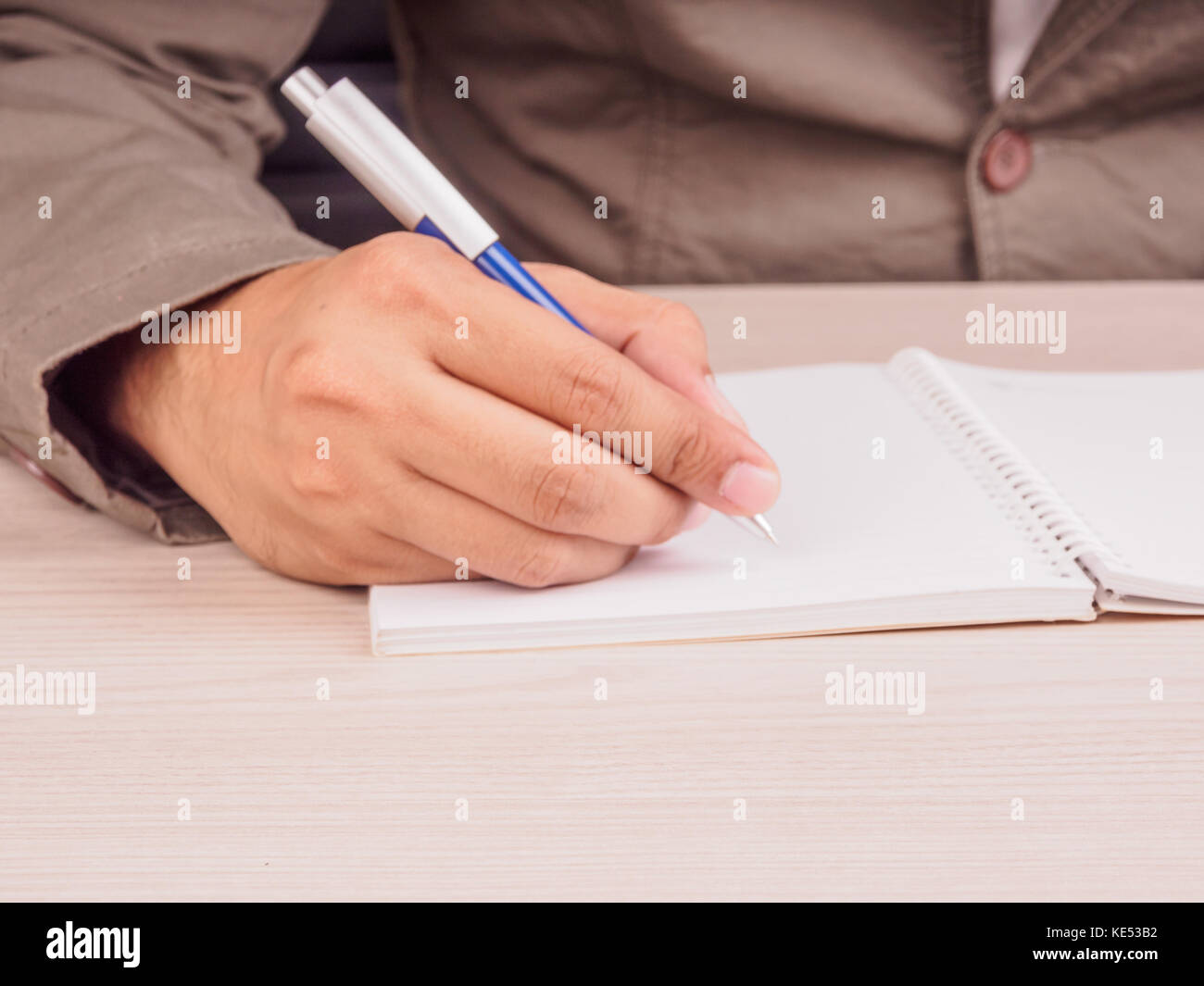 Man holding pen hi-res stock photography and images - Alamy