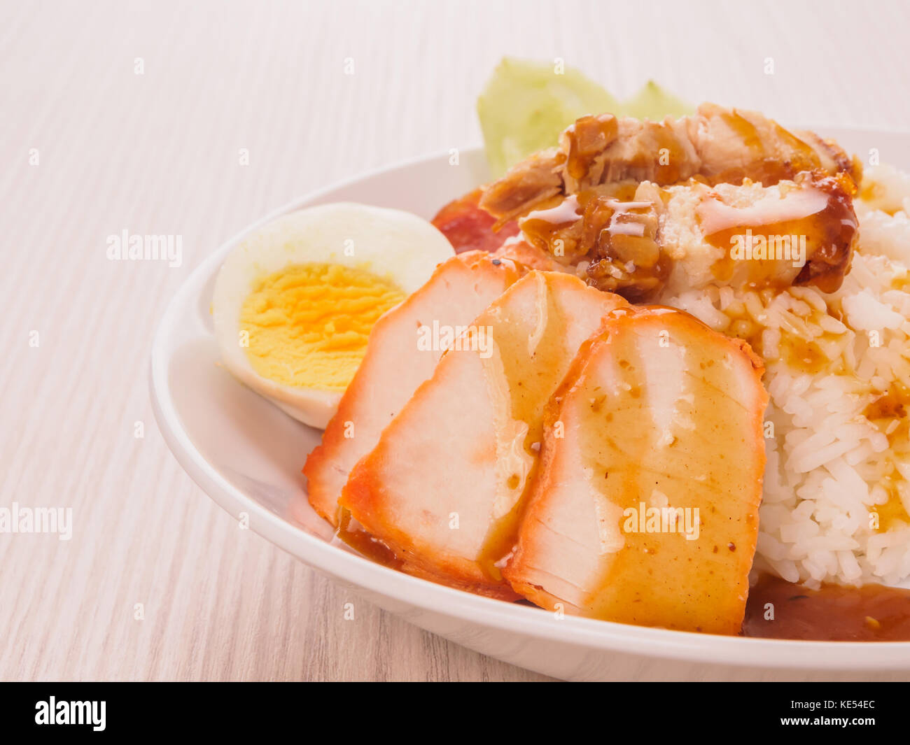 bbq pork and crispy pork with rice Stock Photo - Alamy