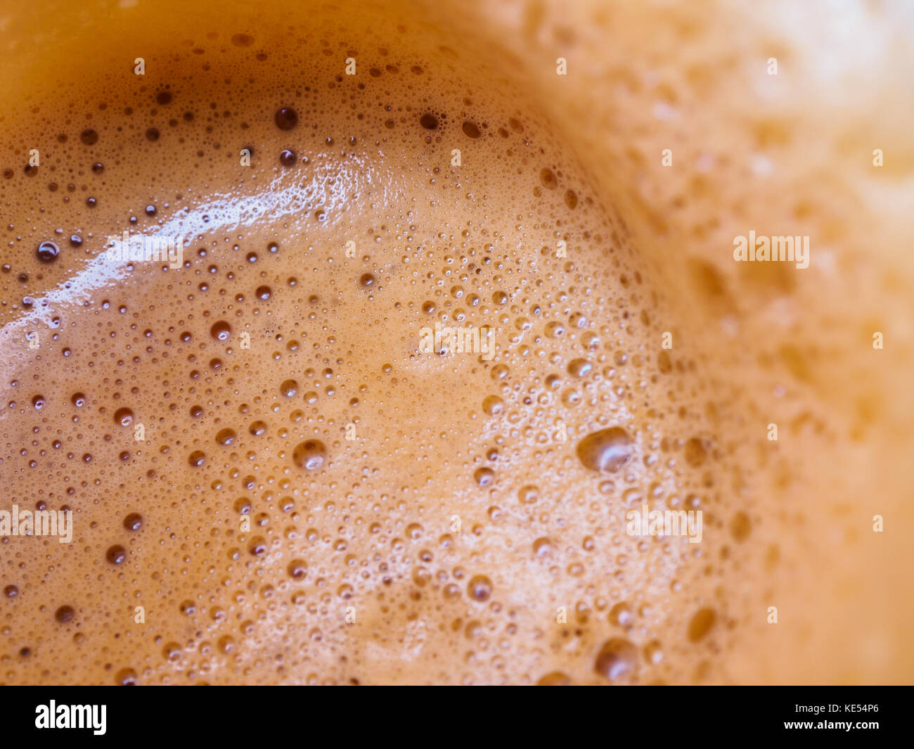 beige frothy coffee background texture Stock Photo - Alamy