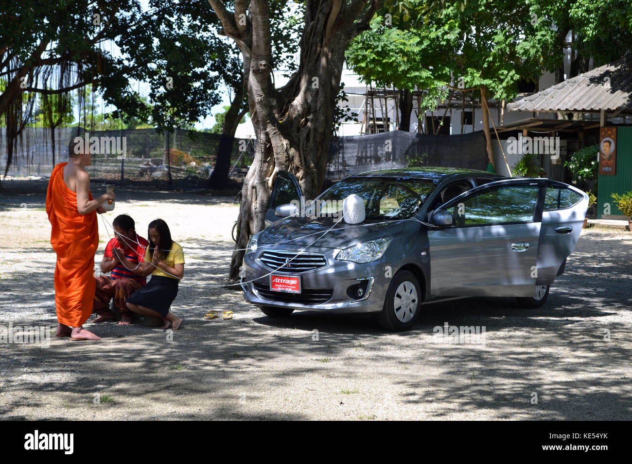 A car is being blessed by a Buddhist monk, Chiang Rai. Pic was taken in ...