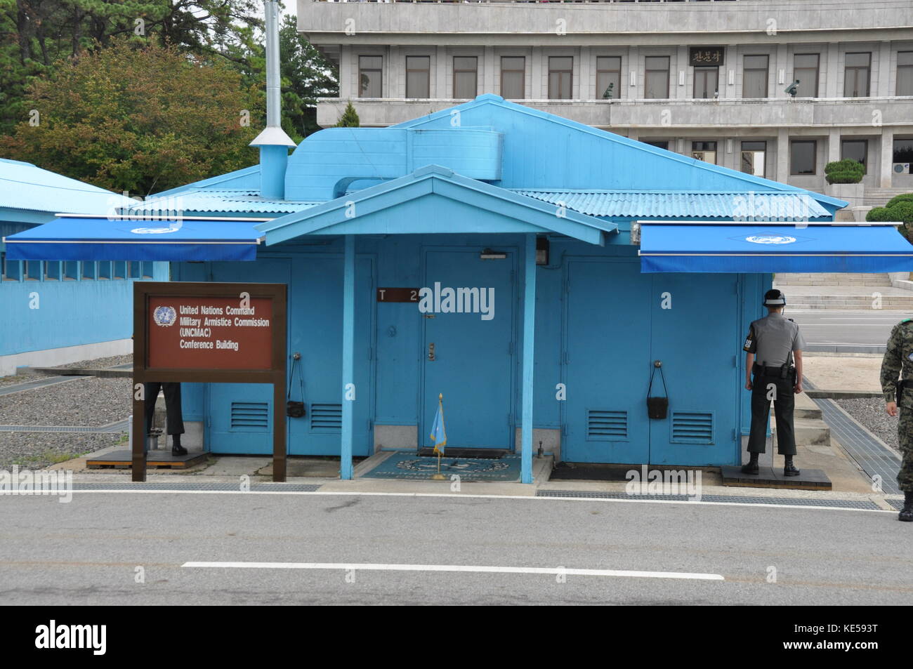 PANMUNJOM, SOUTH KOREA - SEPTEMBER 26, 2014: Korean soldiers watching ...