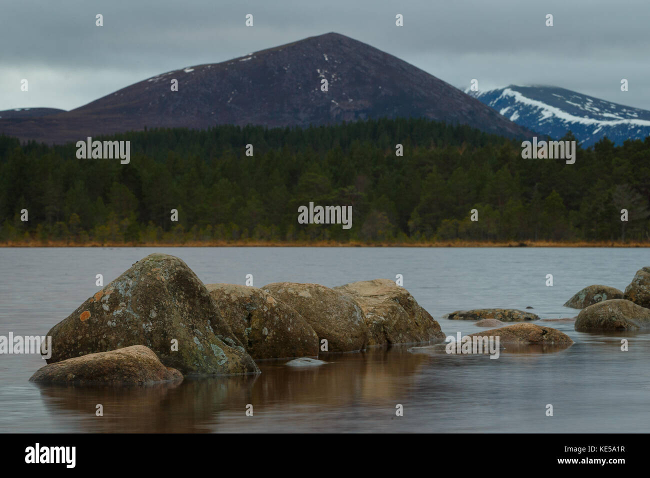 Stones in a lake Stock Photo - Alamy
