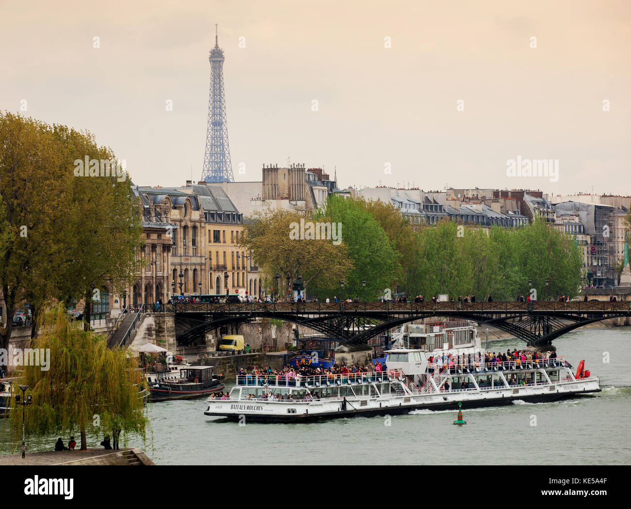 Paris, France - April 28, 2013: Eiffel Tower and tour boats called ...