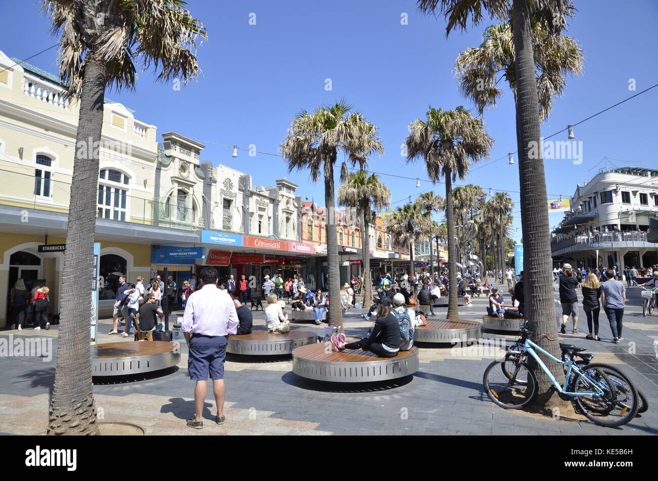 A street scene of The Corso, the main shopping street in Manly, Sydney ...
