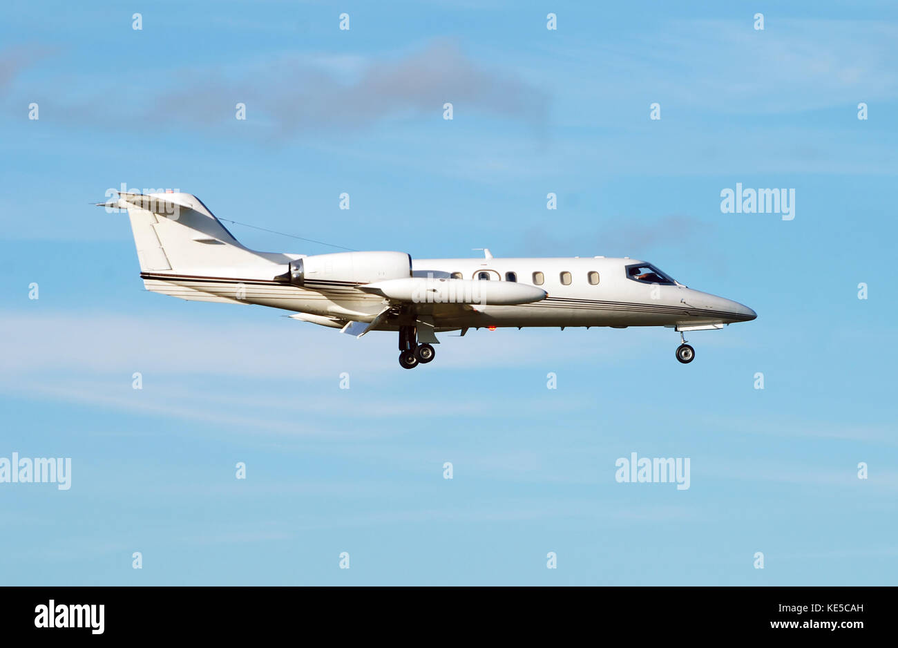 Business jet side view Stock Photo - Alamy