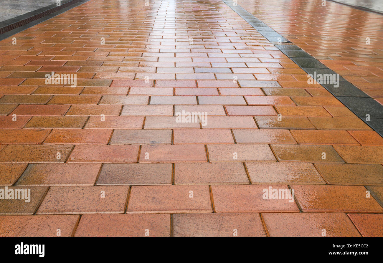 Wet pavement in rain Stock Photo - Alamy