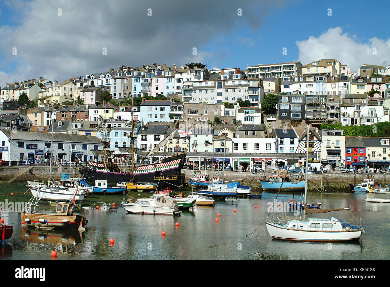 Brixham Harbor and replica of Golden Hind, in Brixham marina, Devon ...