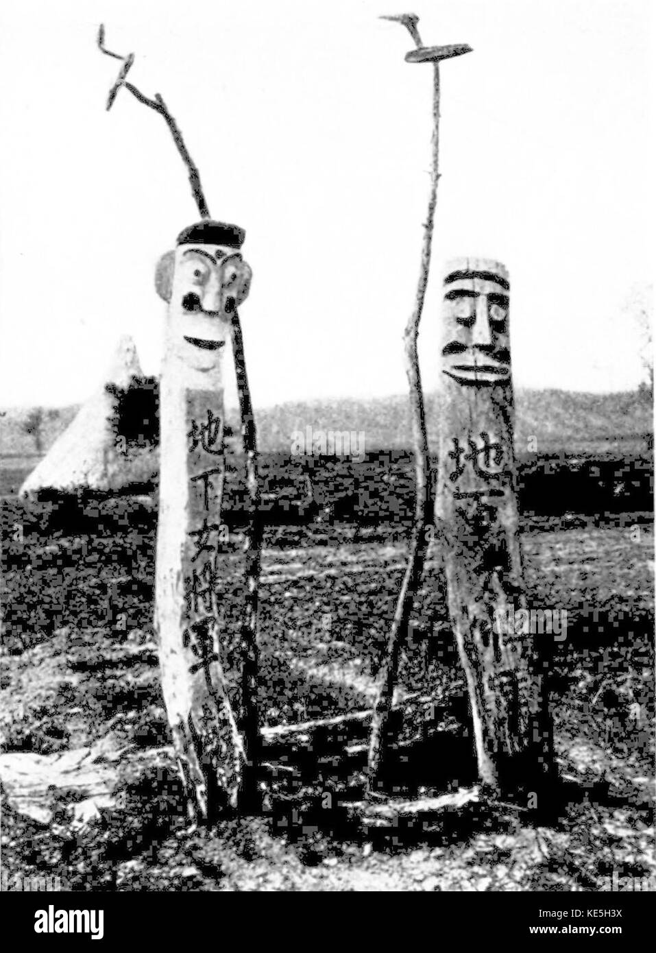 Village devil posts Stock Photo - Alamy