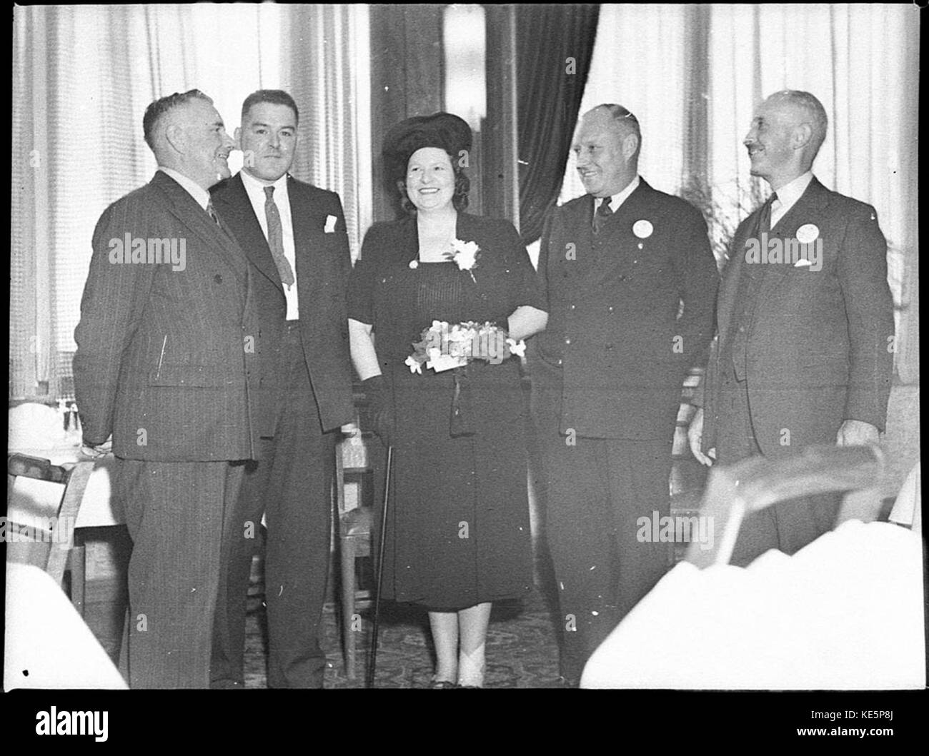 This image shows a formal dinner held at the Mayfair Hotel in London ...