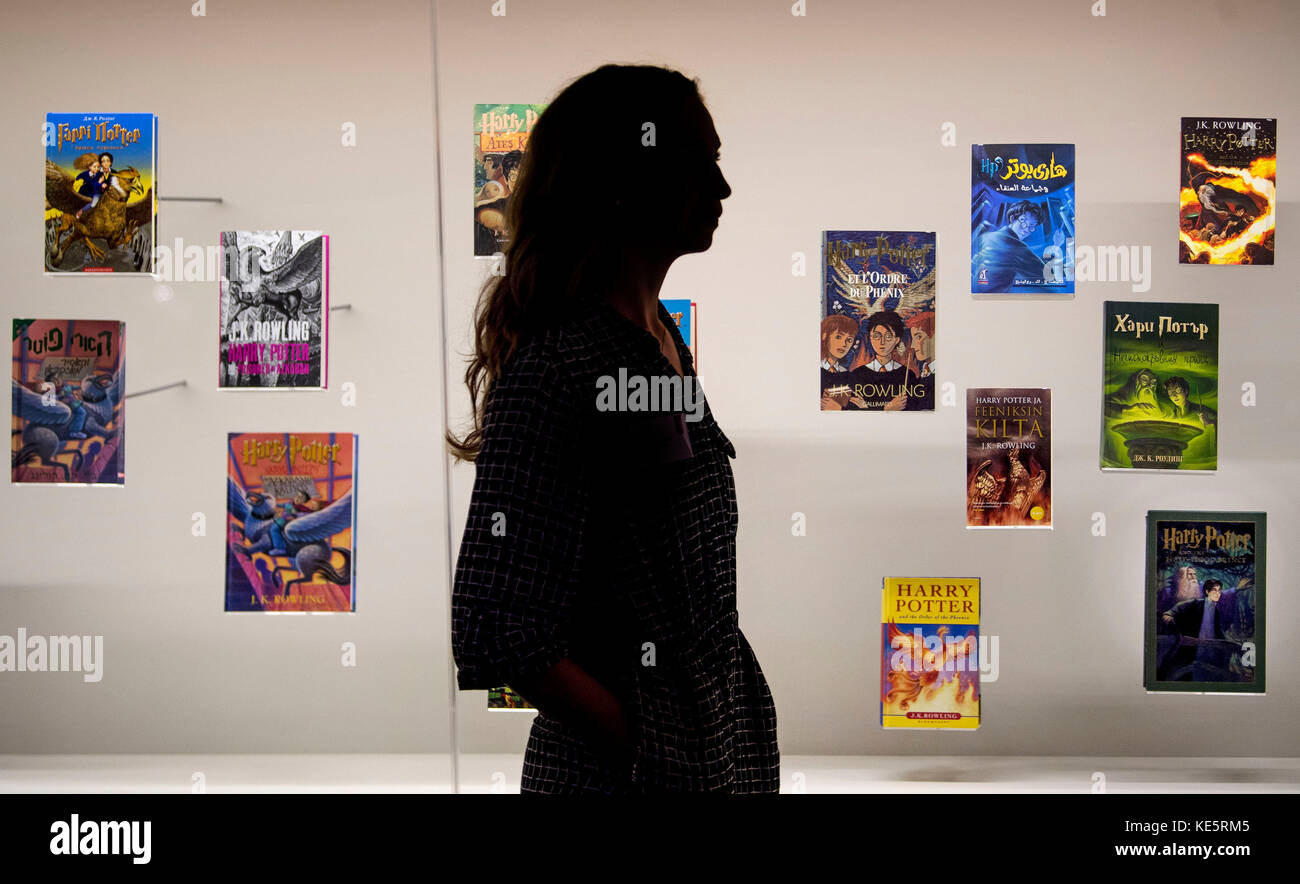 A visitor walks past a display of foreign language editions of the ...