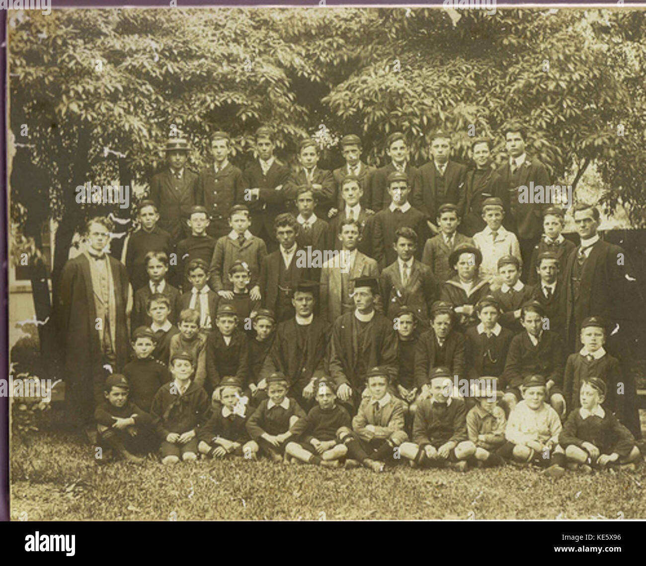 The photograph 'TrinityGS1913' captures an image of a group, likely ...