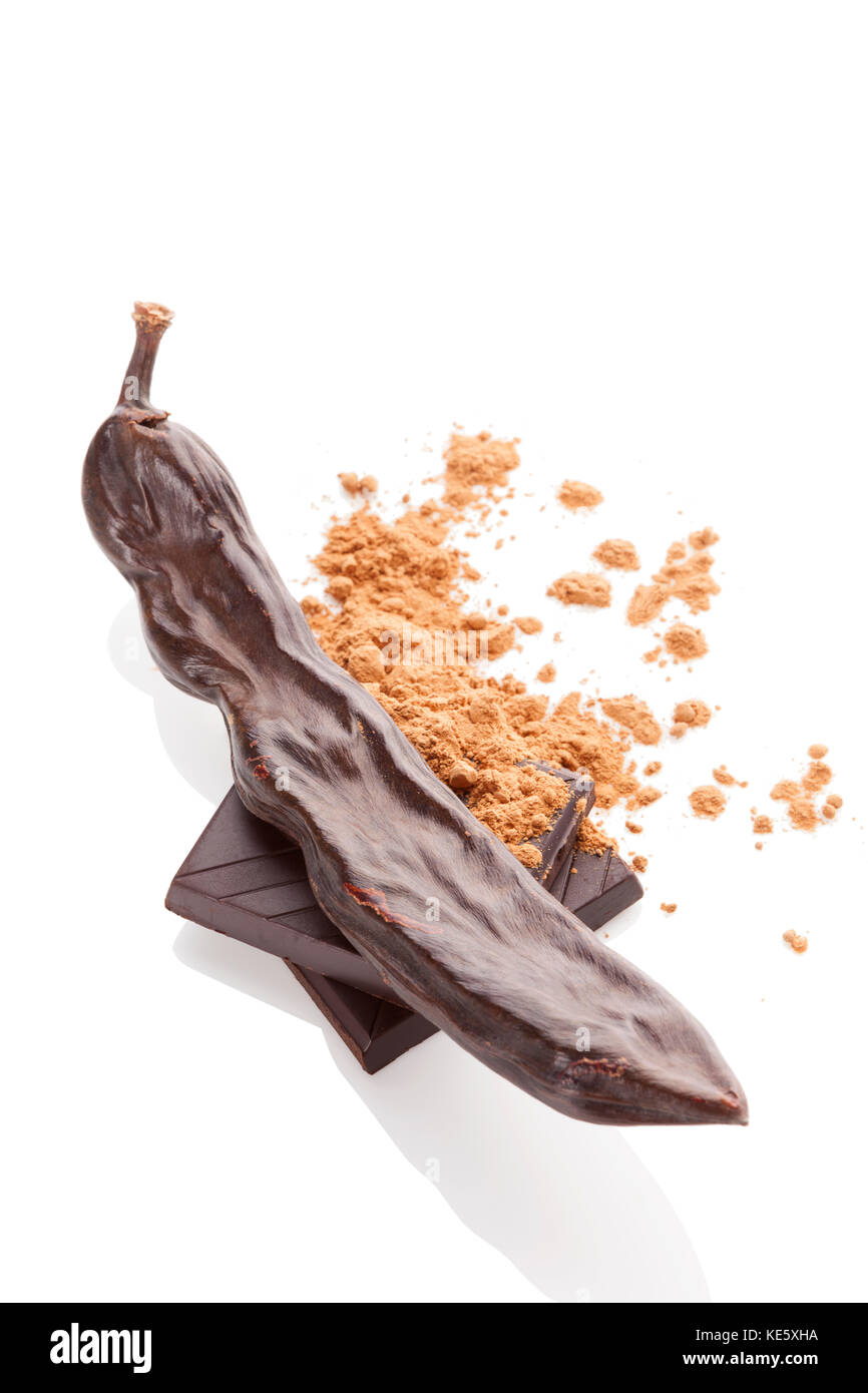 Carob powder and carob chocolate isolated on white background Stock ...