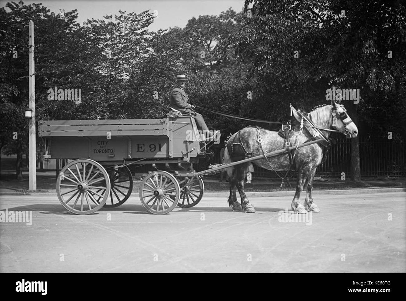 Horse drawn wagon for street cleaning Stock Photo - Alamy