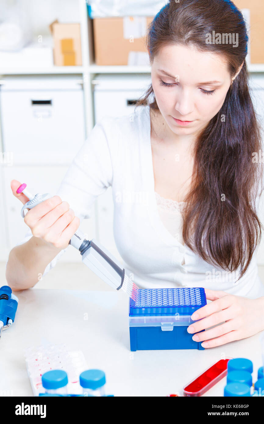 Nurse doing medical analysis Stock Photo - Alamy