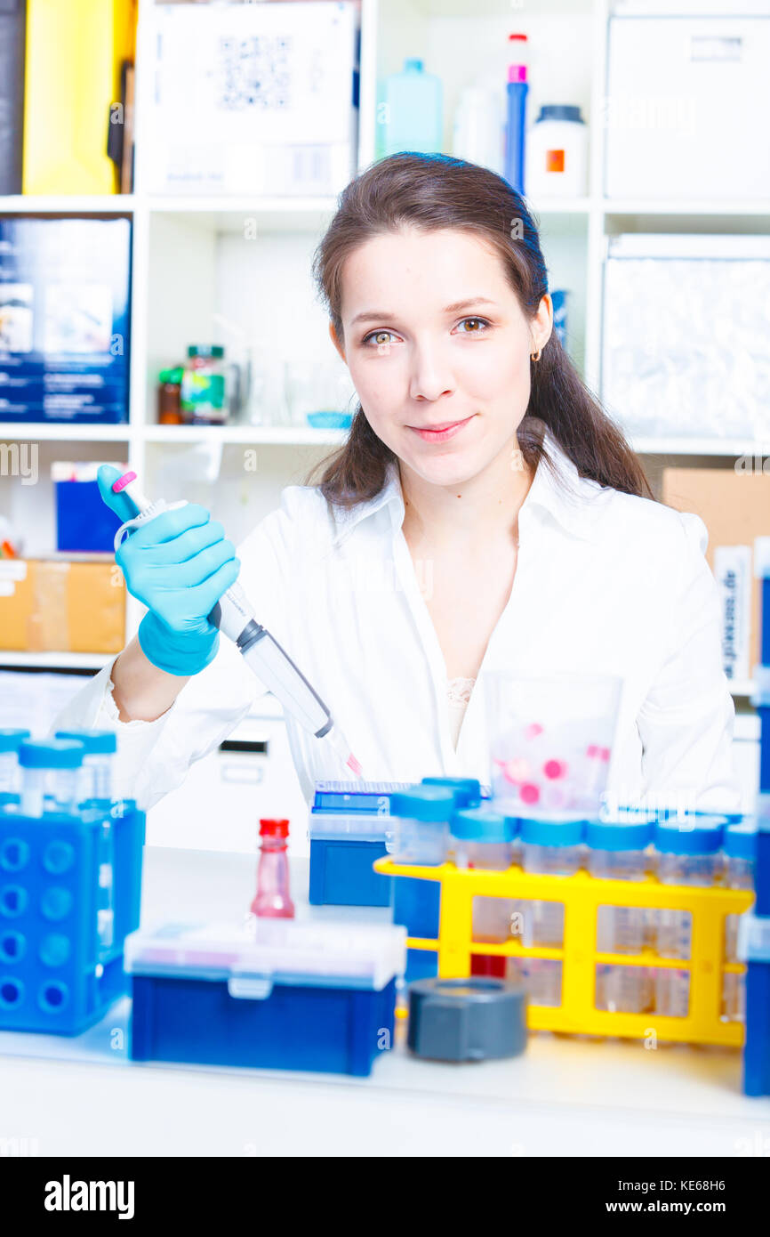 Female technician doing science experiment Stock Photo - Alamy Female technician doing science experiment Stock Photo - Alamy