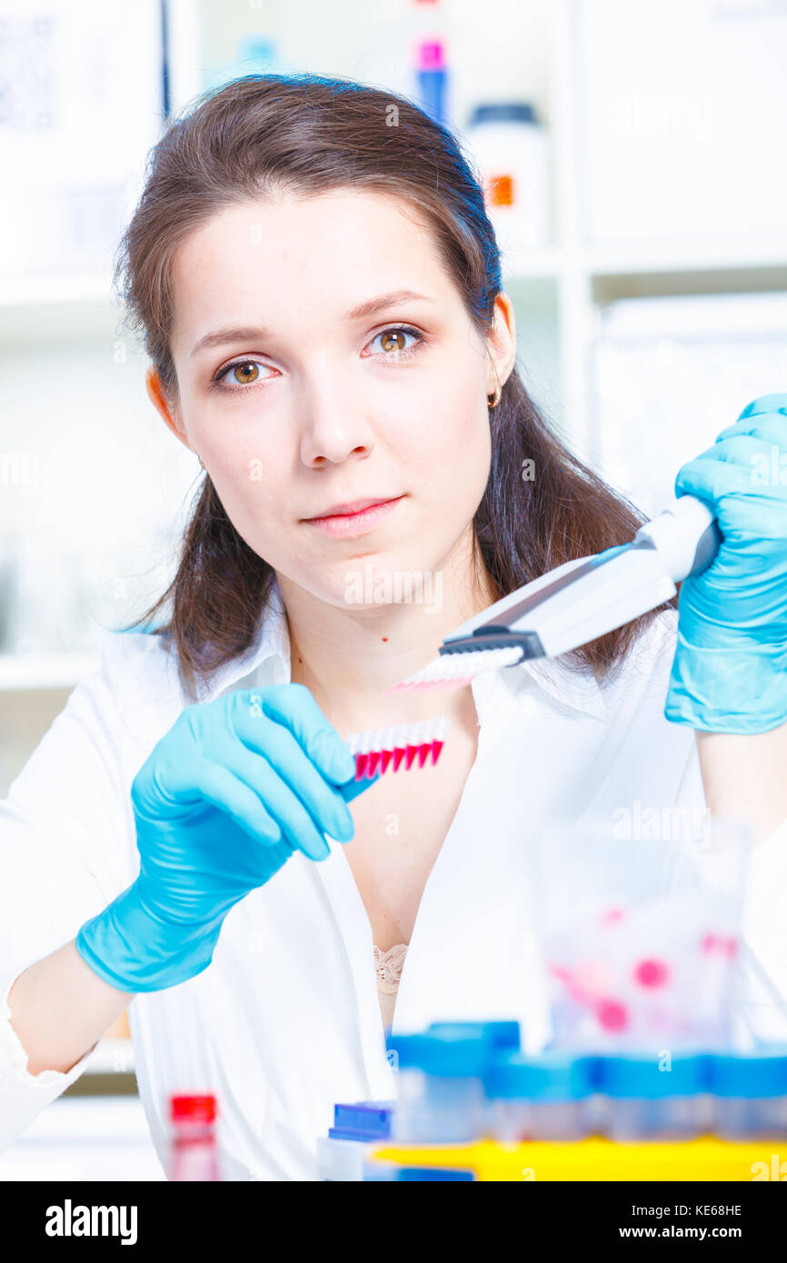 Nurse doing medical analysis Stock Photo - Alamy
