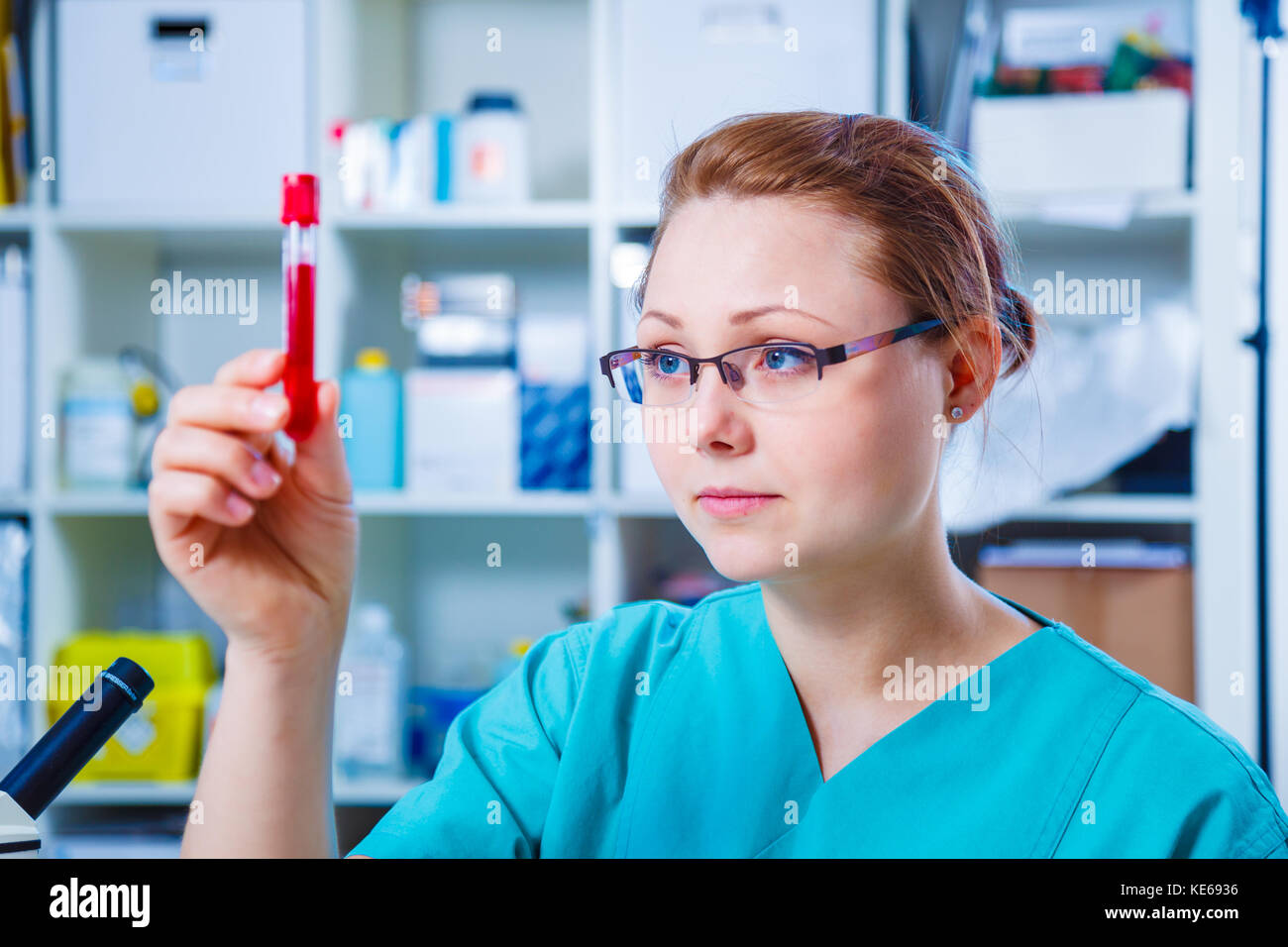 Nurse doing medical analysis Stock Photo - Alamy