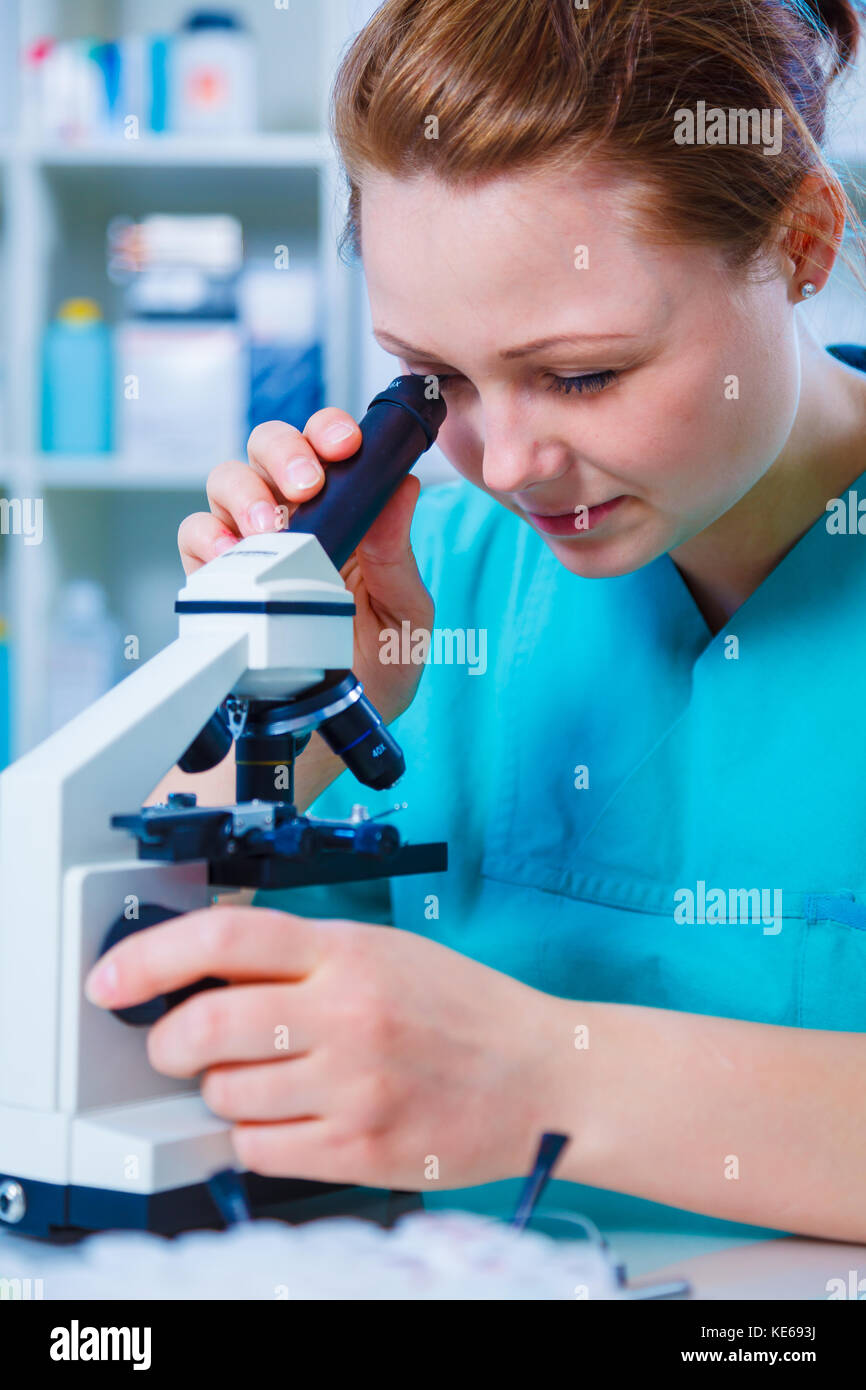 Nurse doing medical analysis Stock Photo - Alamy