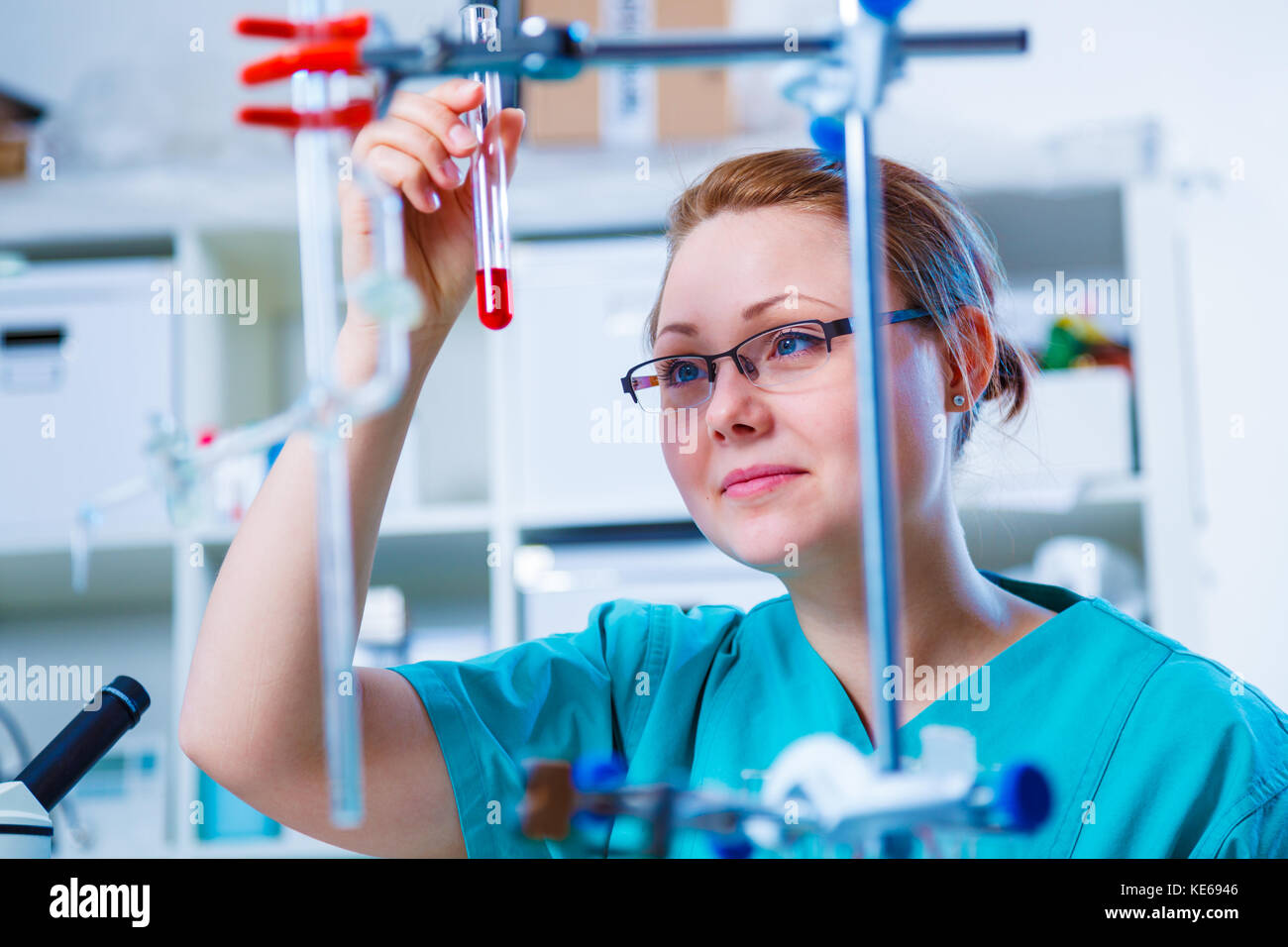 Nurse doing medical analysis Stock Photo - Alamy