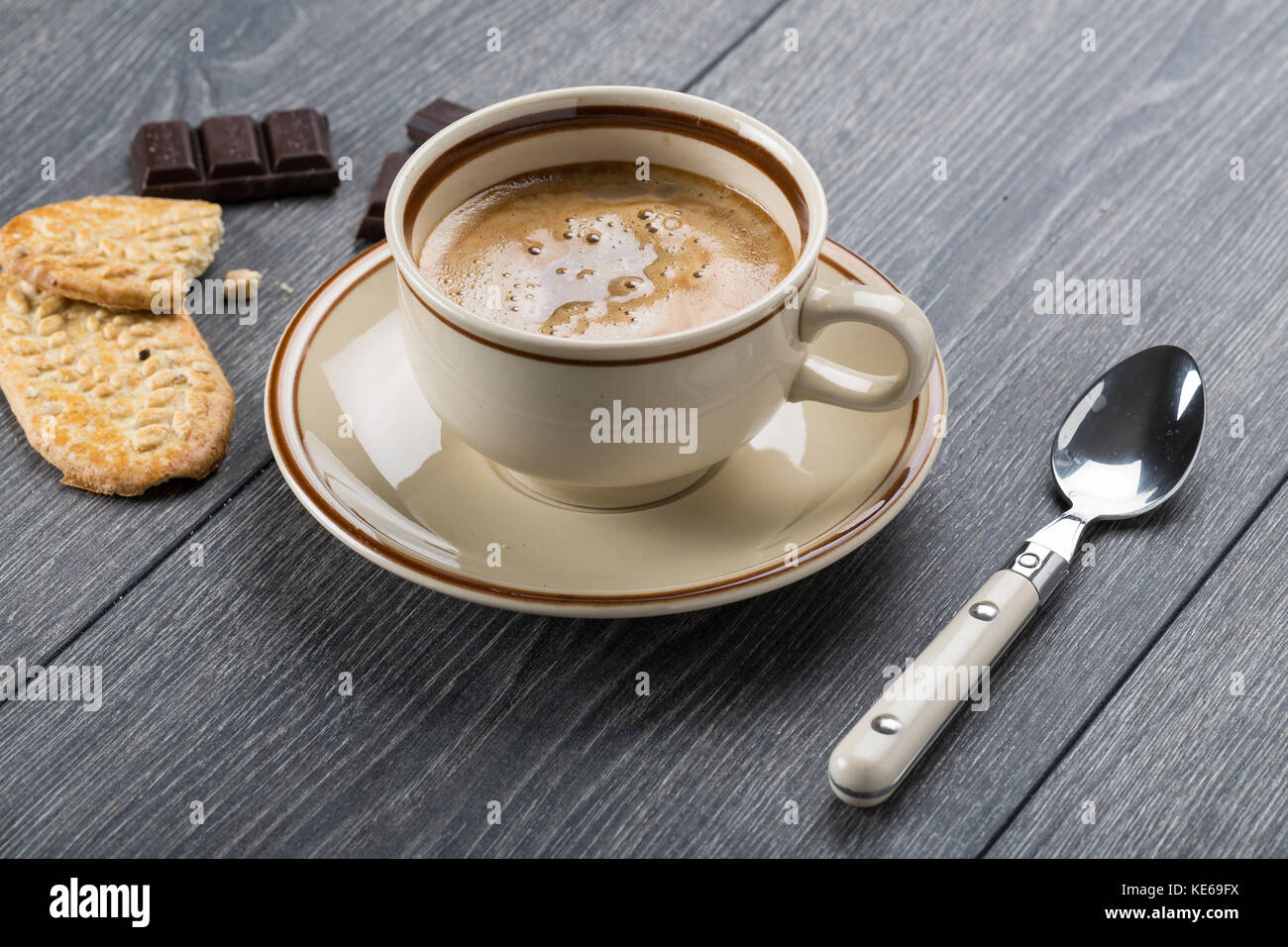 A cup of coffee and biscuits Stock Photo - Alamy