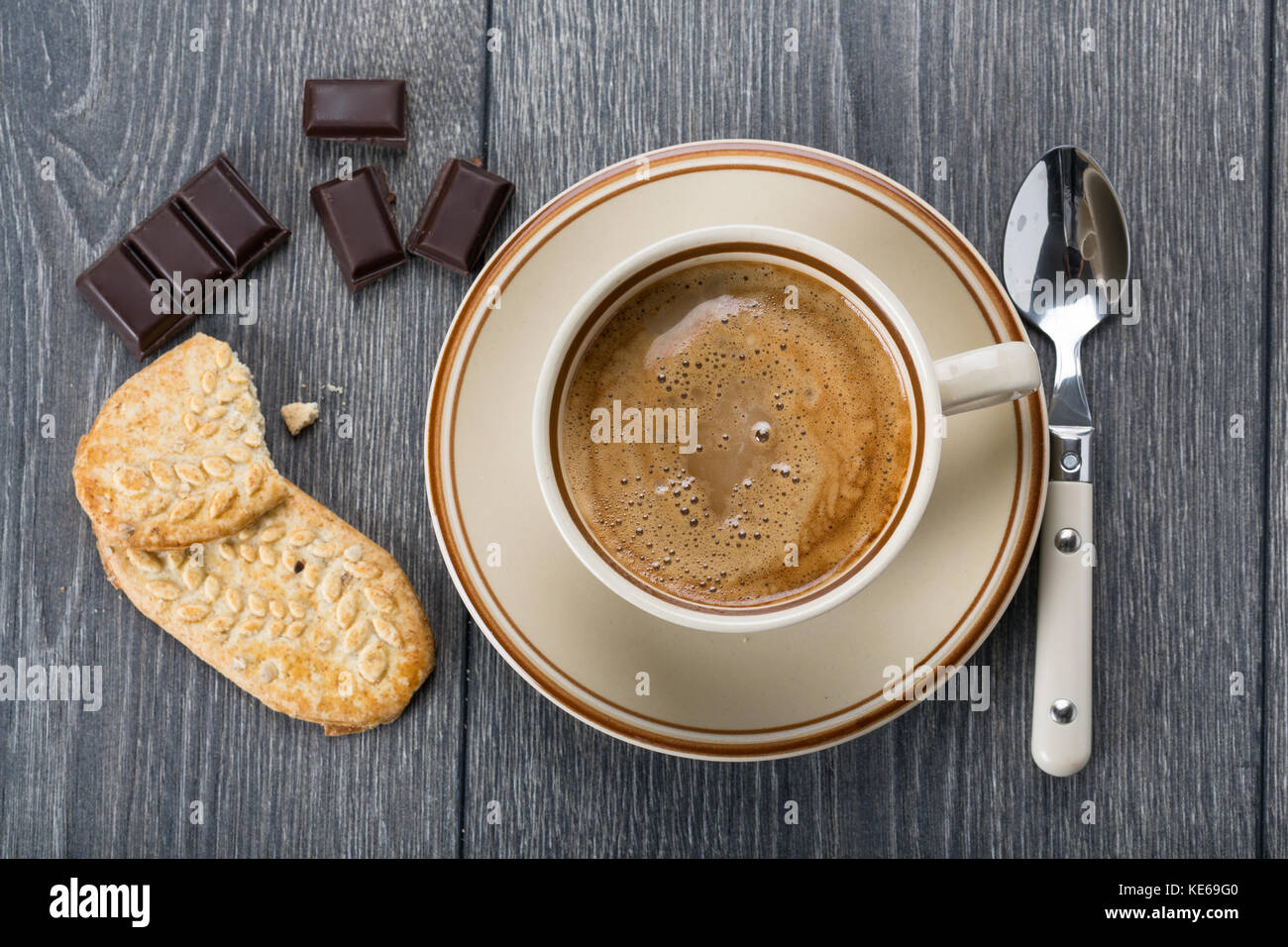 A cup of coffee and biscuits Stock Photo - Alamy