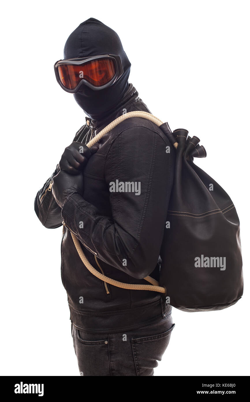 Dangerous burglar dressed in black wearing a mask on head - isolated ...