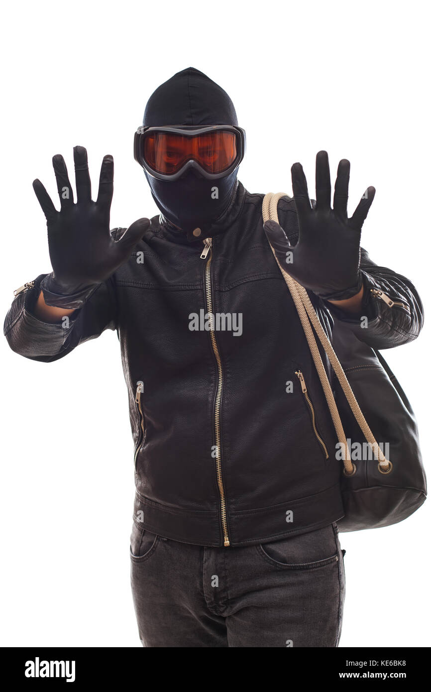 Dangerous burglar dressed in black wearing a mask on head - isolated ...