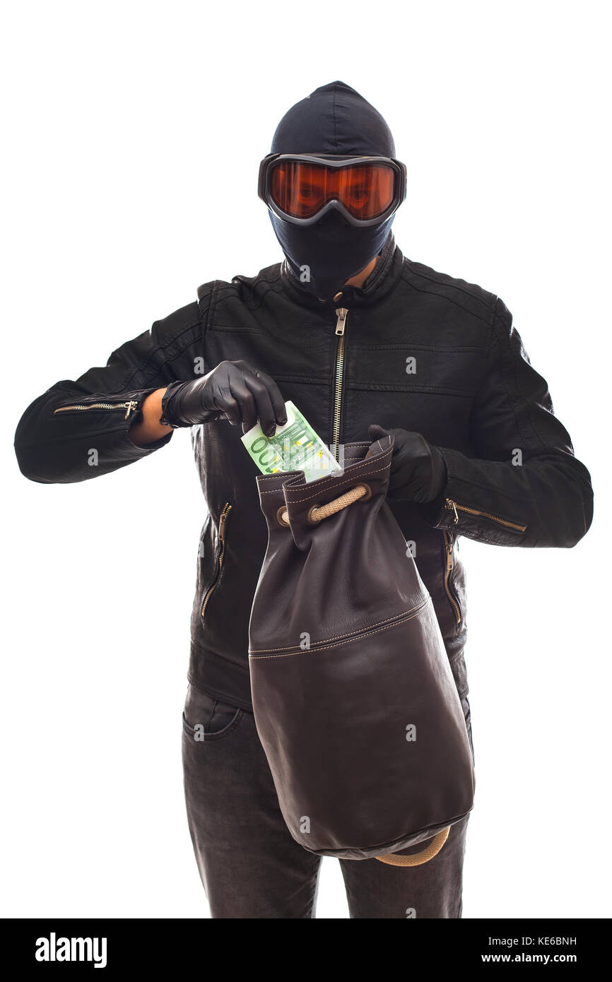 Dangerous burglar dressed in black wearing a mask on head - isolated ...