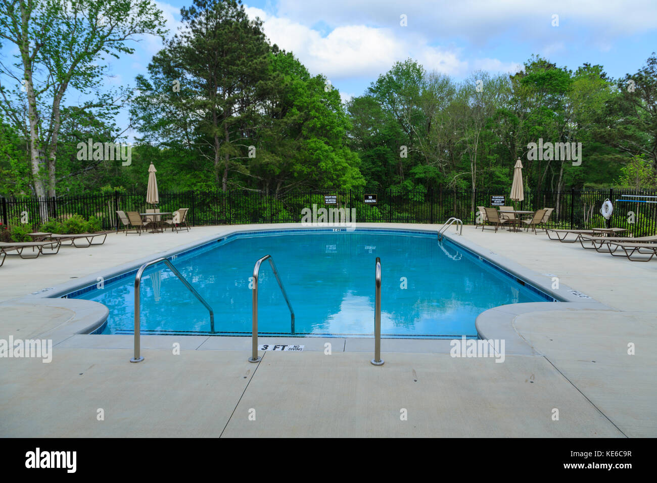 Empty Neighborhood Pool and Deck Stock Photo - Alamy