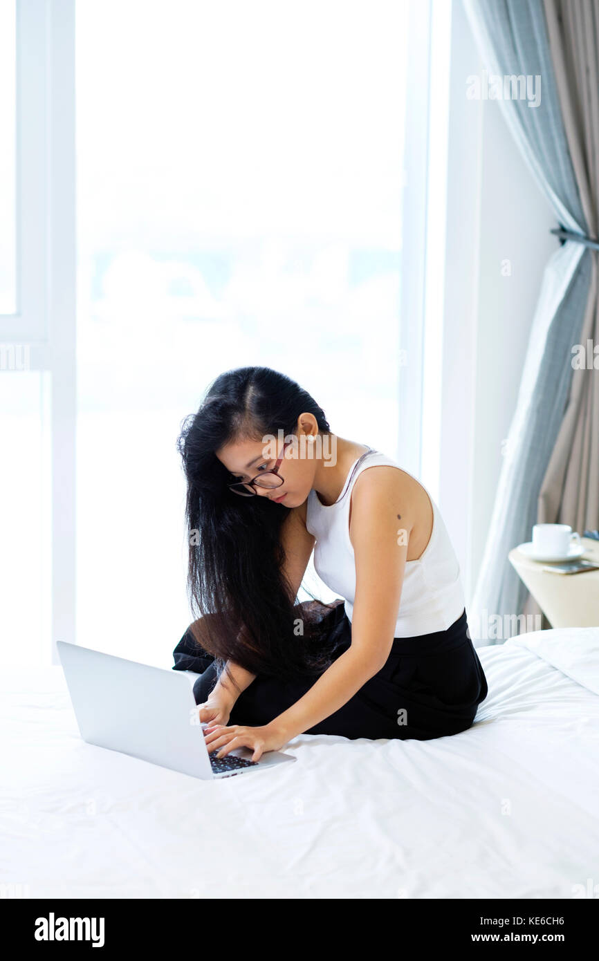 Woman teleworking sitting in hi-res stock photography and images - Alamy