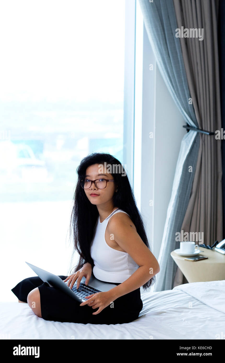 Woman teleworking sitting in hi-res stock photography and images - Alamy