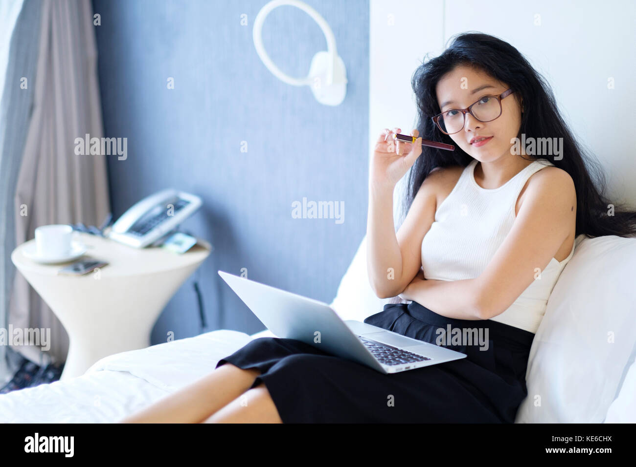 Woman teleworking sitting in hi-res stock photography and images - Alamy