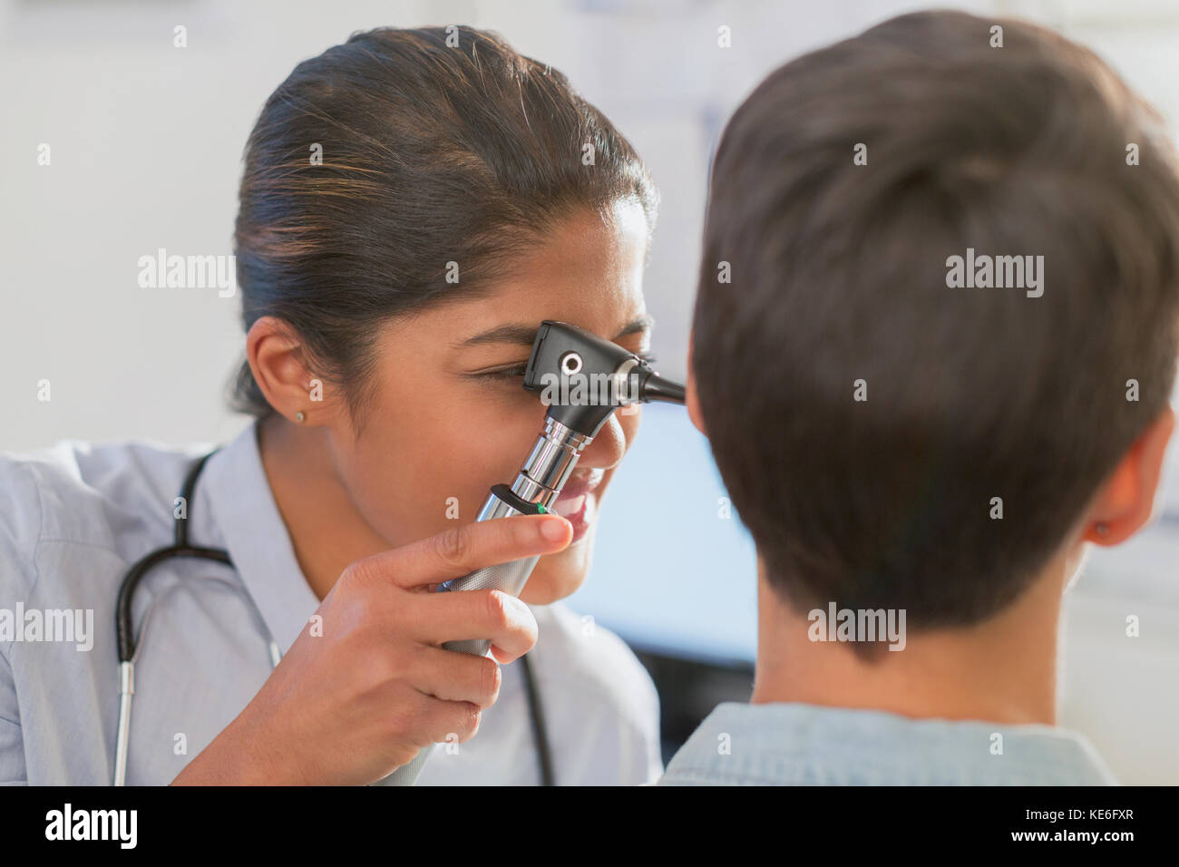 Doctor ear examination hi-res stock photography and images - Alamy