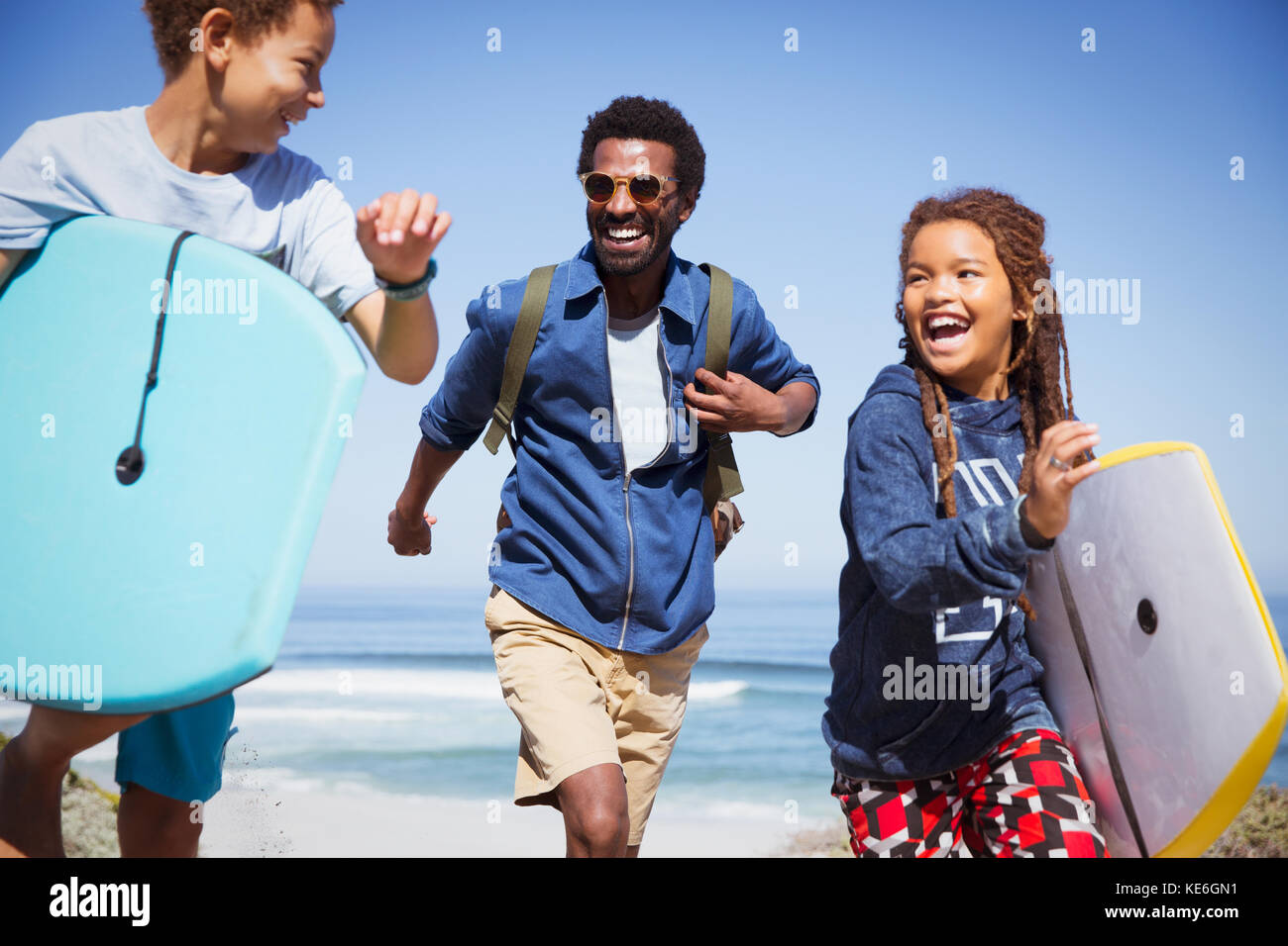 Children with boogie board hi-res stock photography and images - Alamy